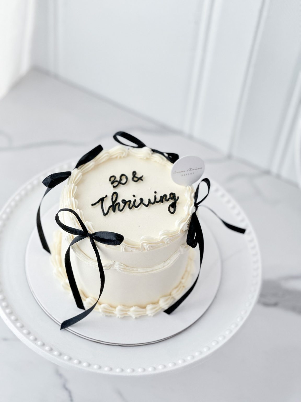 Coquette Ribbon Cake - Creme Maison Bakery